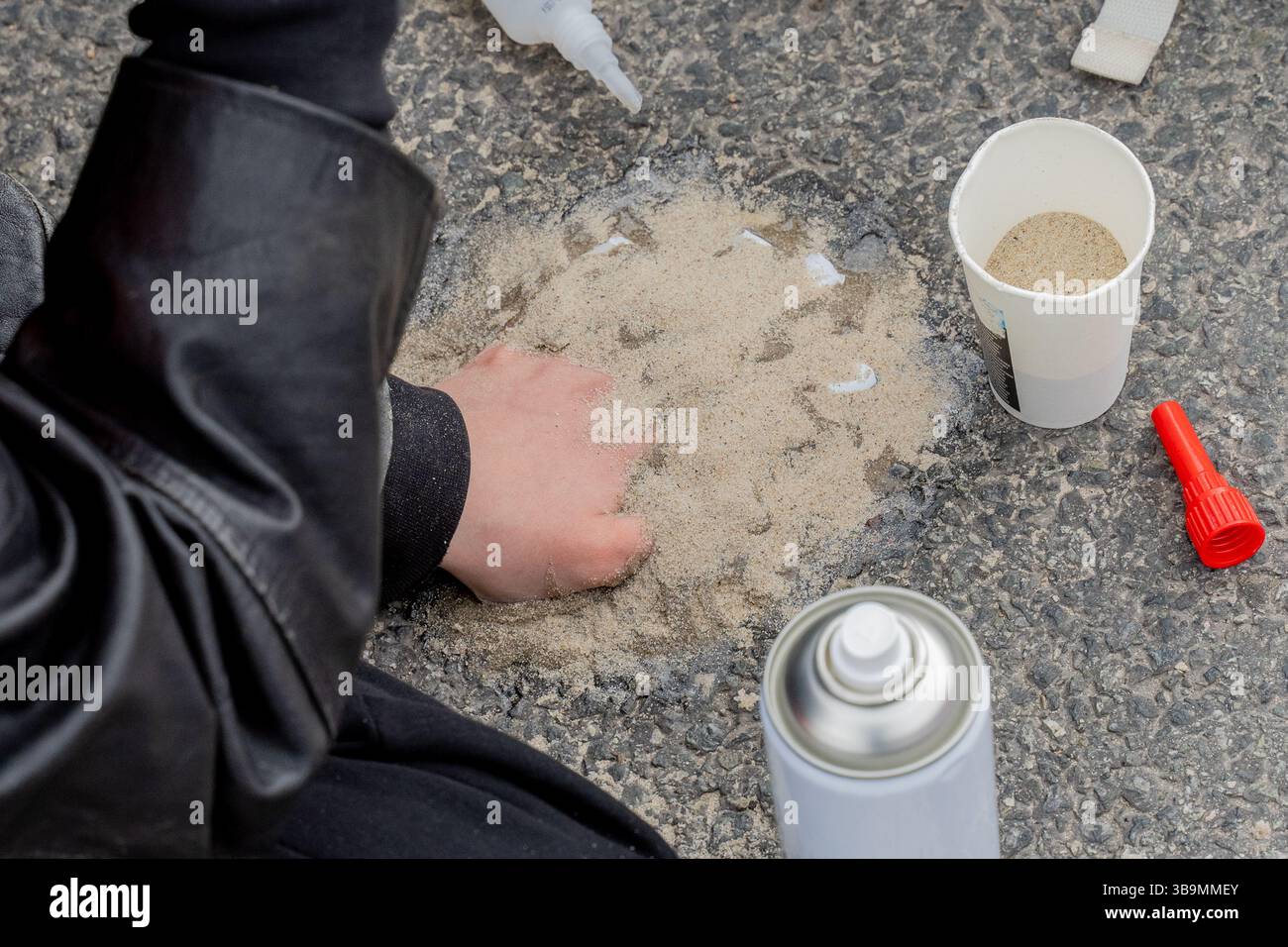 A member of the Ostatnie Pokolenie (Last Generation) climate activism ...