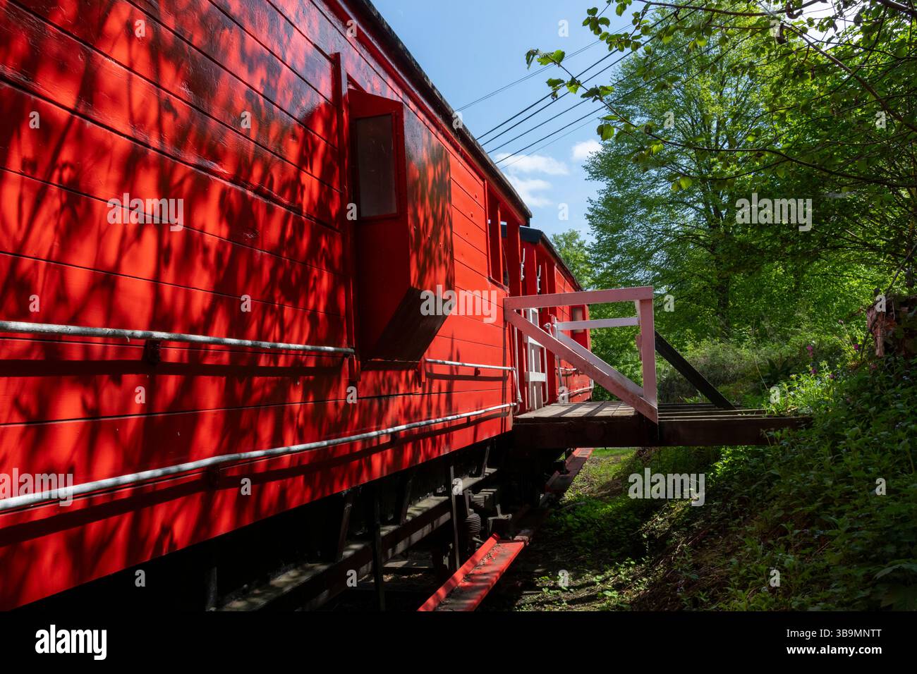 Old railway brake van beside the visitor centre at High Peak Junction ...