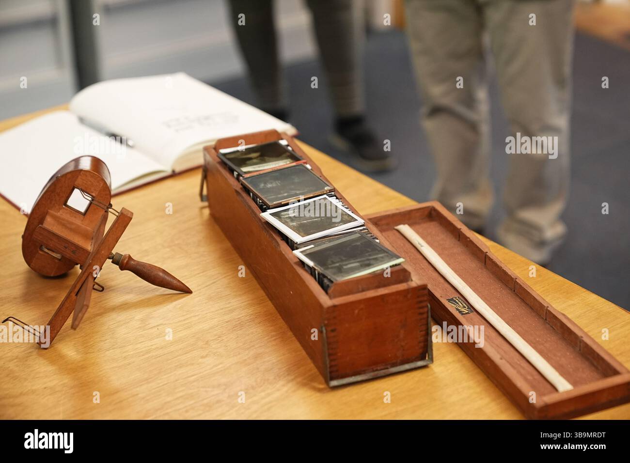 A stereoscopic viewer and slides during a visit by The Princess Royal ...
