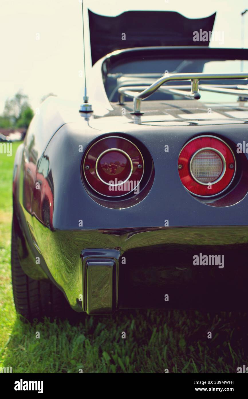 Rear Close-Up of a Classic Chevrolet Corvette with Round Tail Lights ...