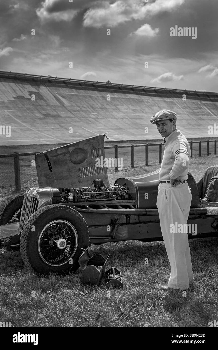 Standing next to car Black and White Stock Photos & Images - Alamy