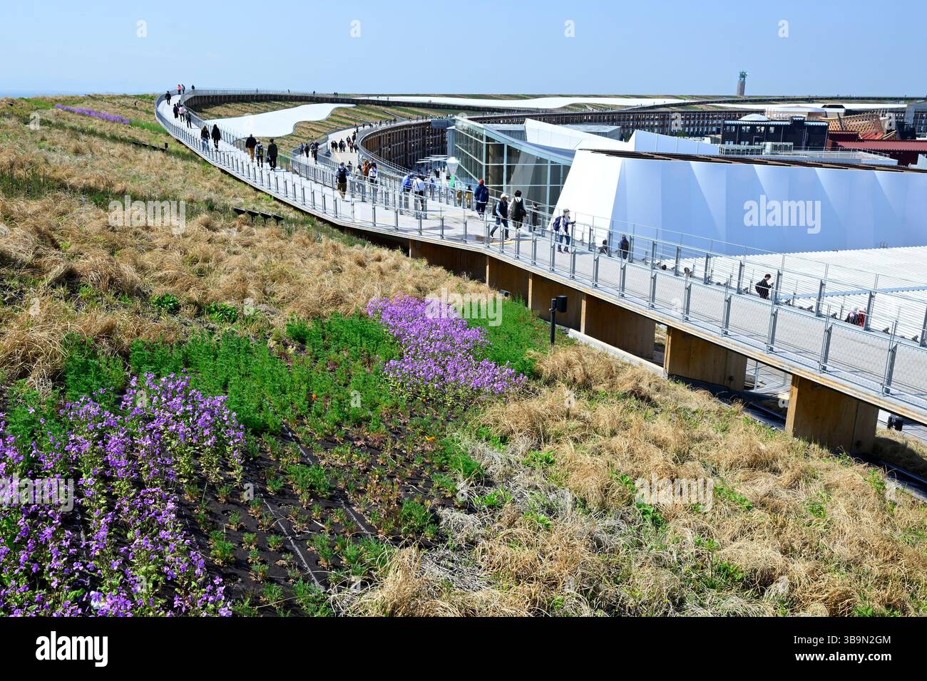Visitors walking along the Grand Ring, the large circular skywalk at ...