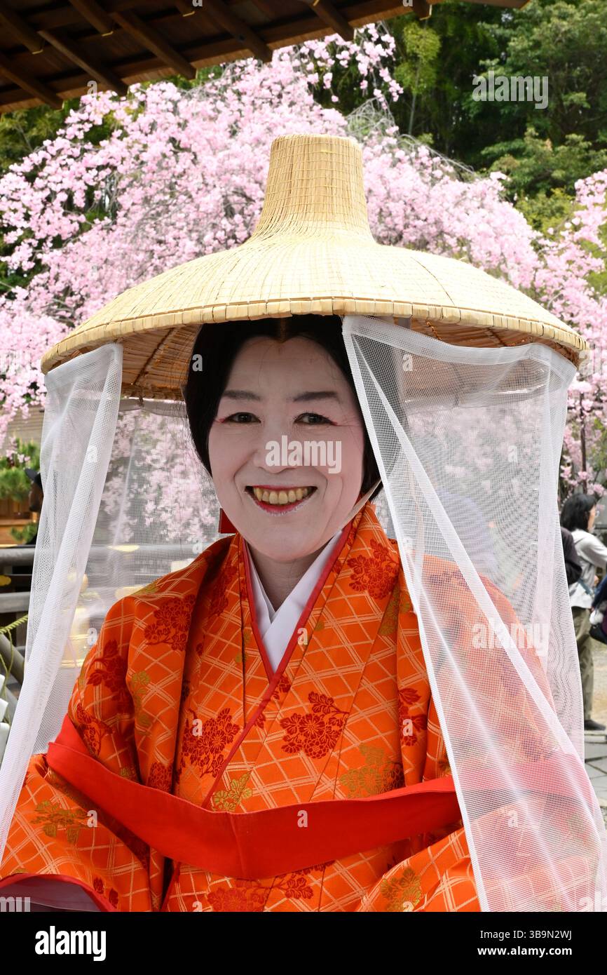 Japanese women in costumes from the Heian period, Hirano shrine's cherry blossom procession ...