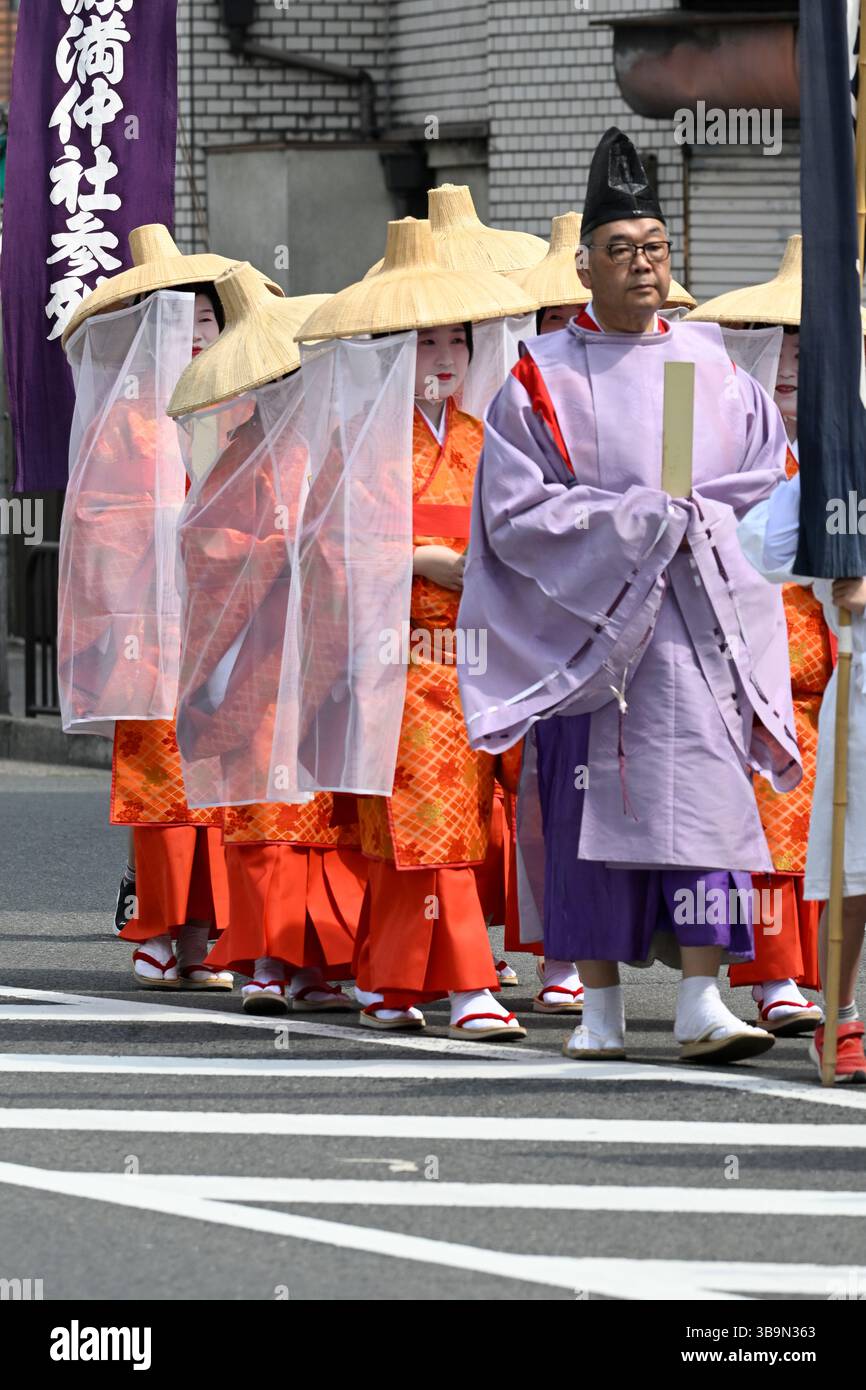 Japanese women in costumes from the Heian period, Hirano shrine's ...