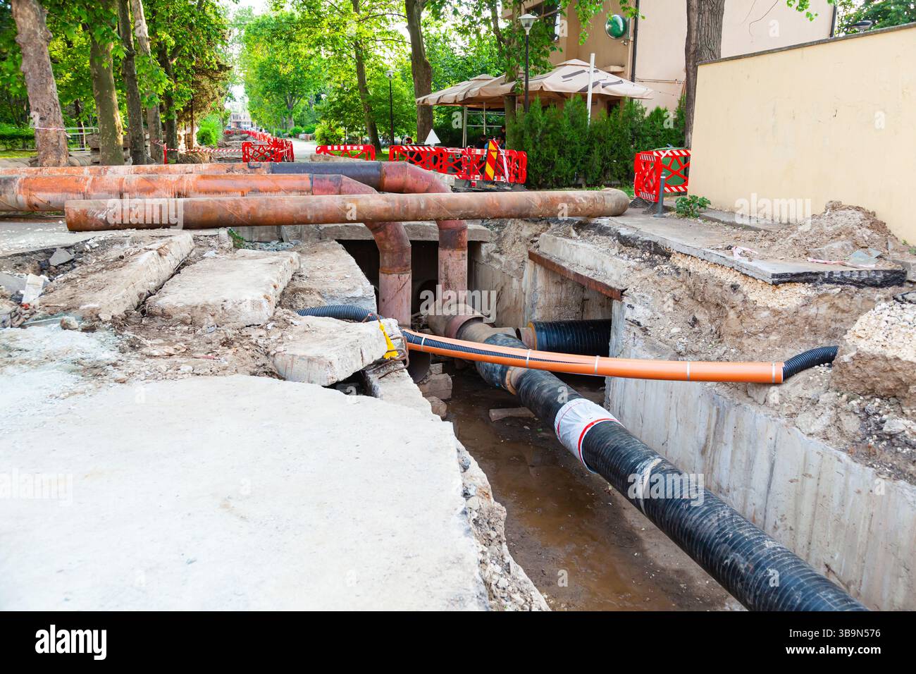 Laying new large diameter water pipes in the ground in the city Stock ...