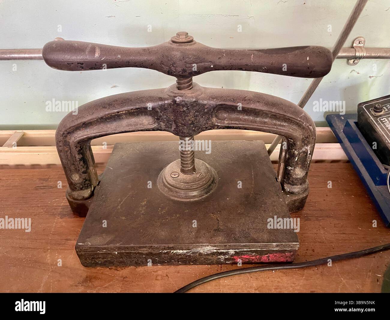 classic old wood working and metal working machinery in a classroom in ...