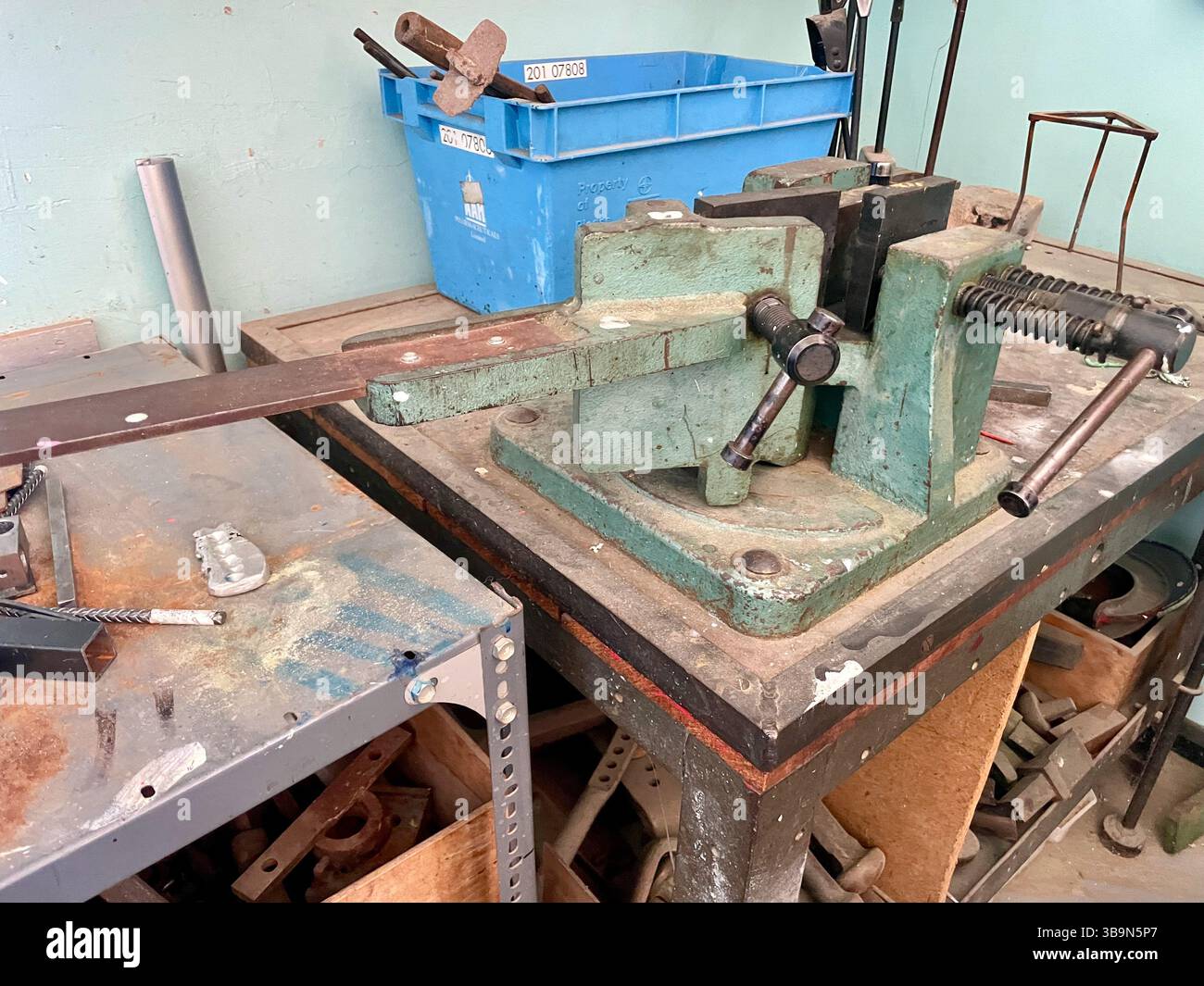 classic old wood working and metal working machinery in a classroom in ...