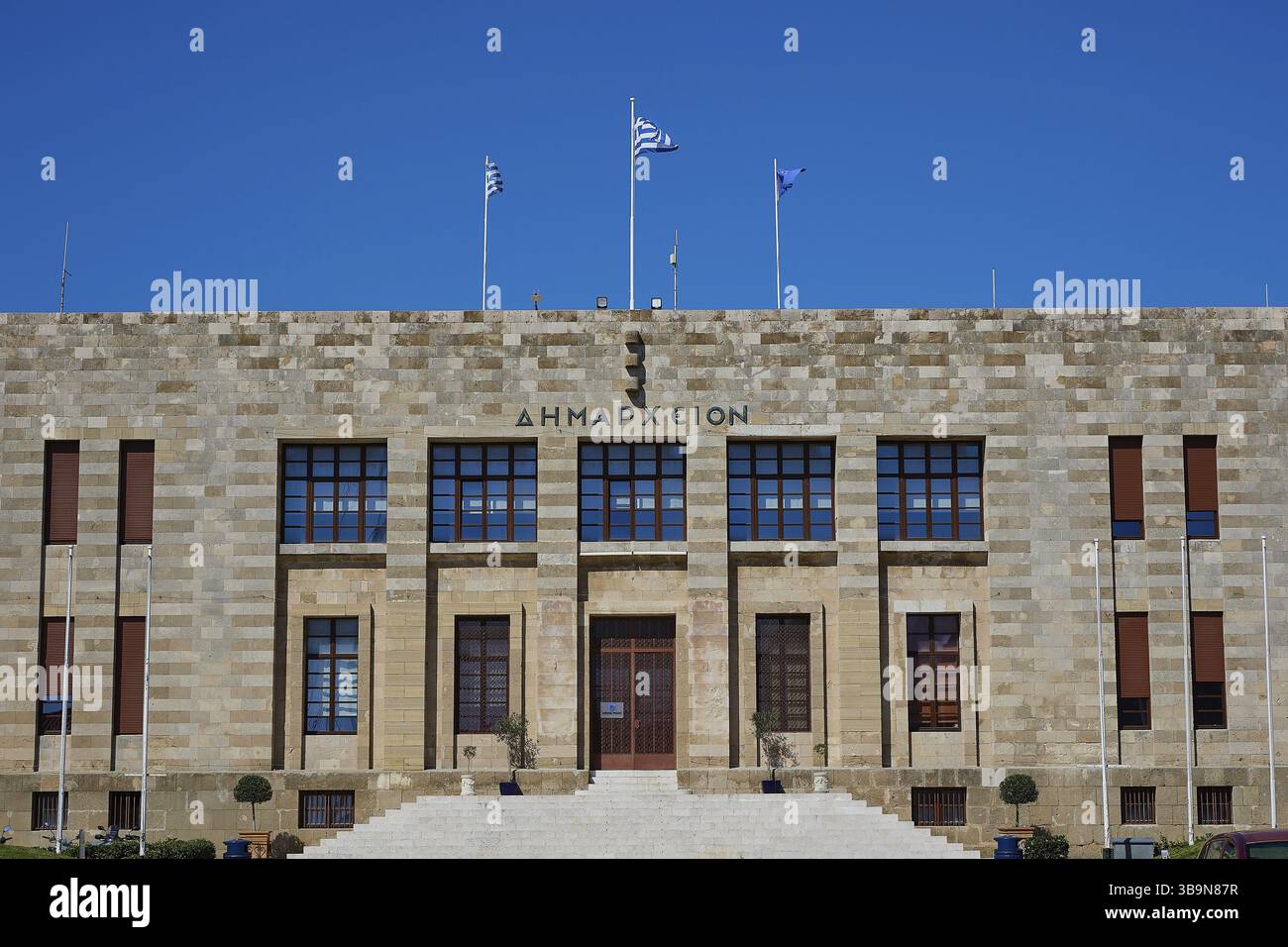 Town Hall, Italian colonial style, stone building with Greek writing ...