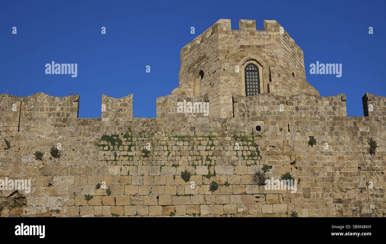 Rhodes city wall, tower, detail of the castle tower with artistically ...
