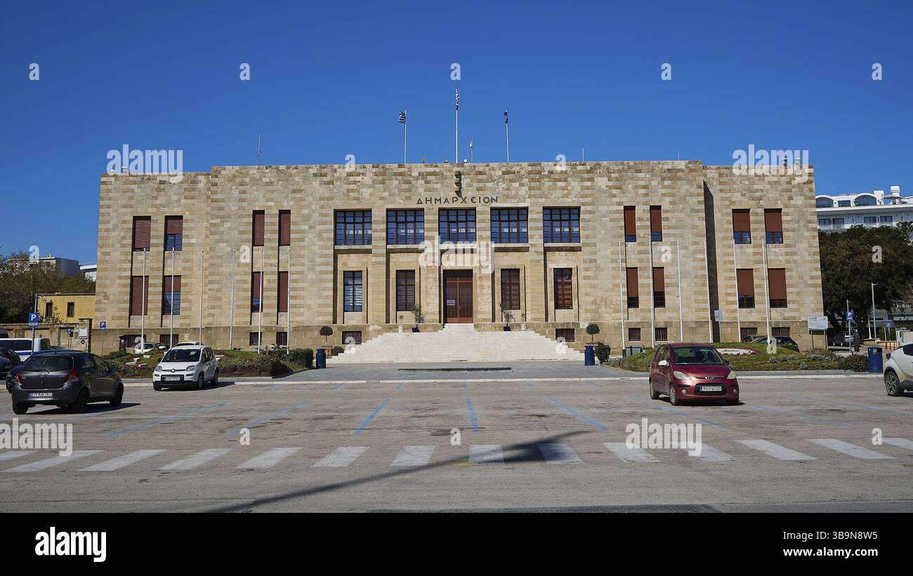 Town Hall, Italian colonial style, Large stone building with cars and ...