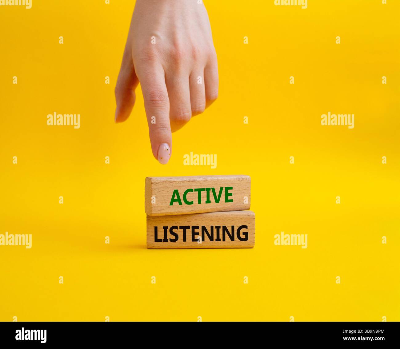 Active listening symbol. Wooden blocks with words Active listening ...