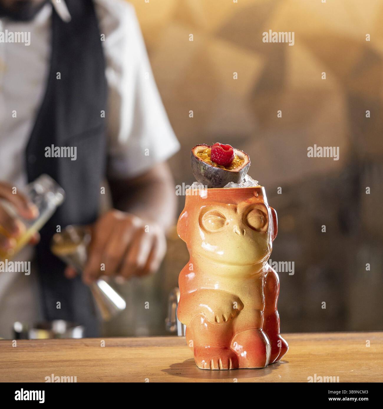 Tiki Drink Cocktail. One tropical tiki cocktail on bar counter. Tiki ...