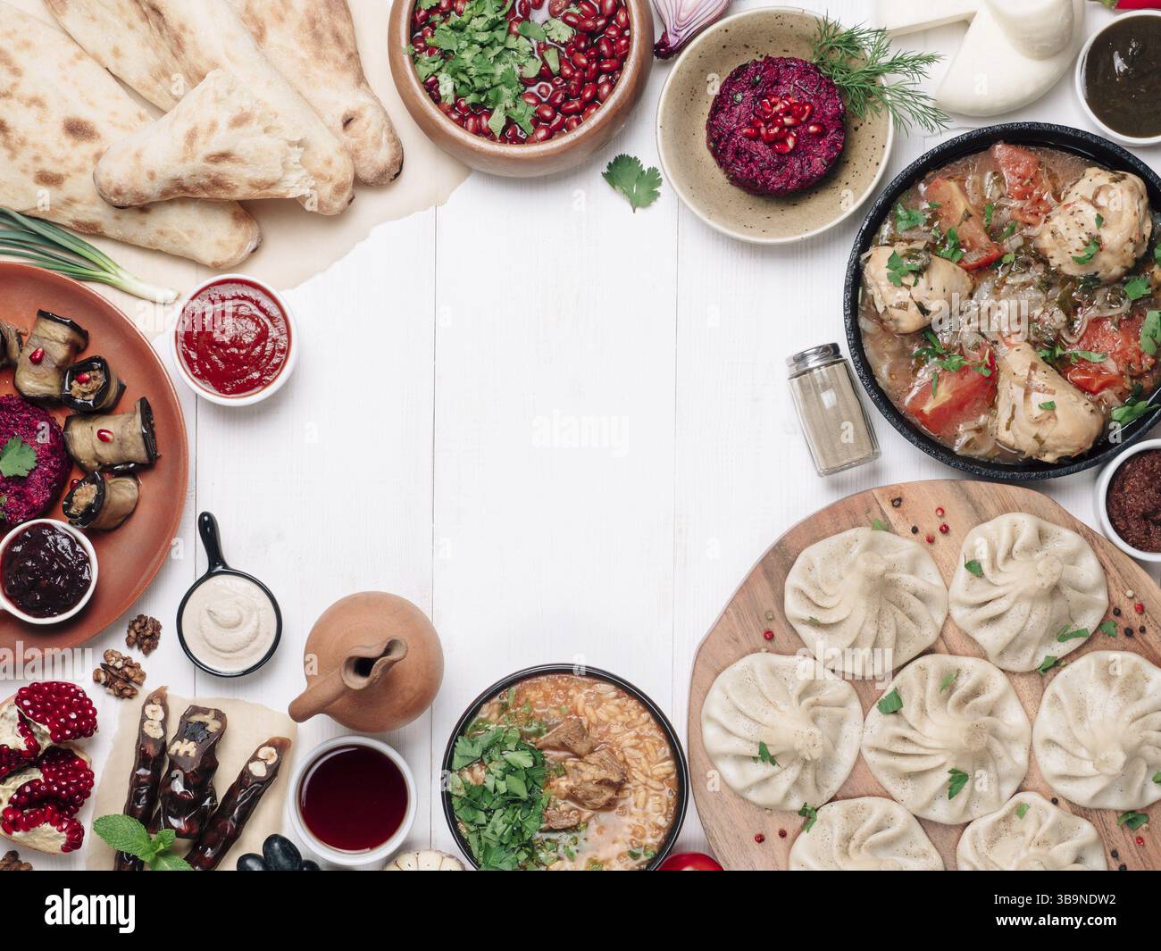 View from above of georgian cuisine on whitewooden table.Traditional ...