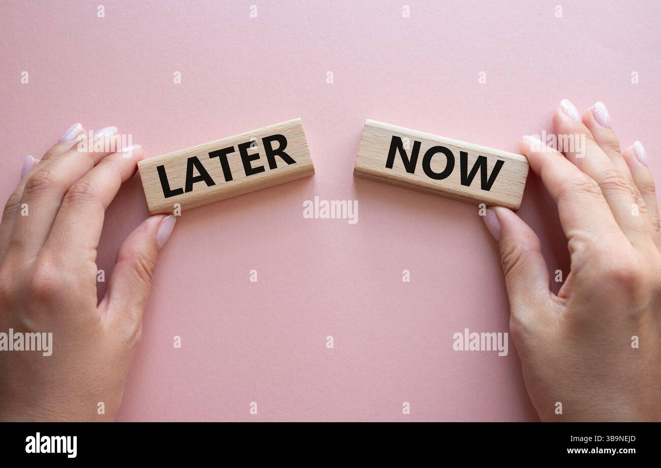 Now vs Later symbol. Concept word Now vs Later on wooden blocks ...