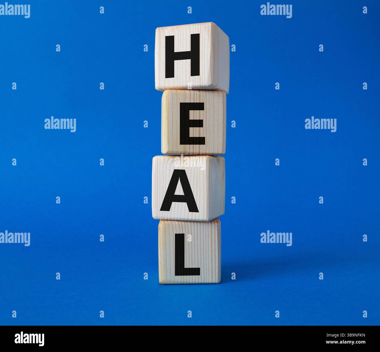 Heal symbol. Concept word Hate on wooden cubes. Beautiful blue ...
