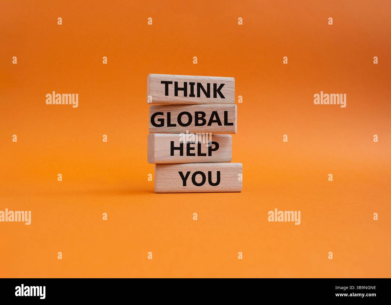 Think global act local symbol. Wooden blocks with words Think global ...