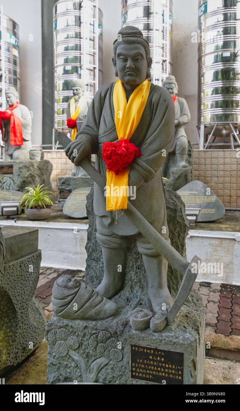 Kuala Lumpur, Malaysia - Feb. 19, 2025: Statue no.12 of the 24 Filial ...