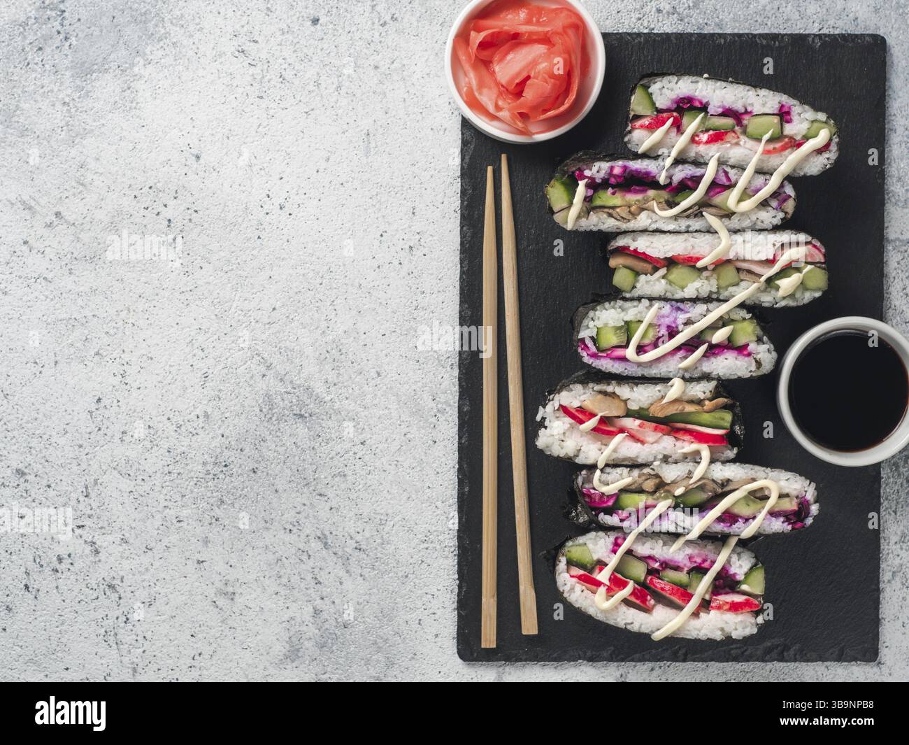 Vegan sushi sandwich onigirazu with mushrooms and vegetables.Healthy ...