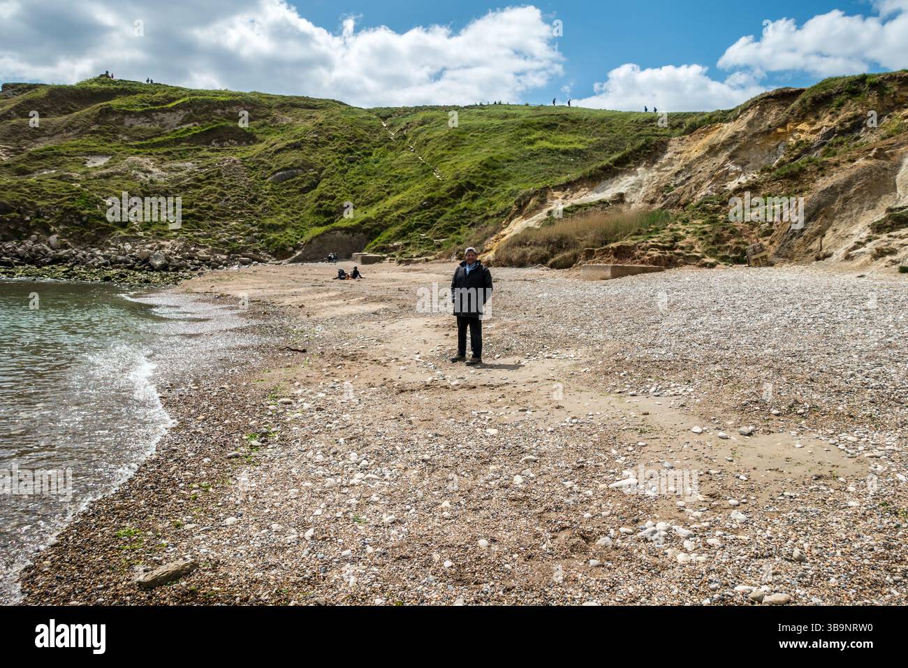 The pebble beach at Lulworth Cove Stock Photo - Alamy