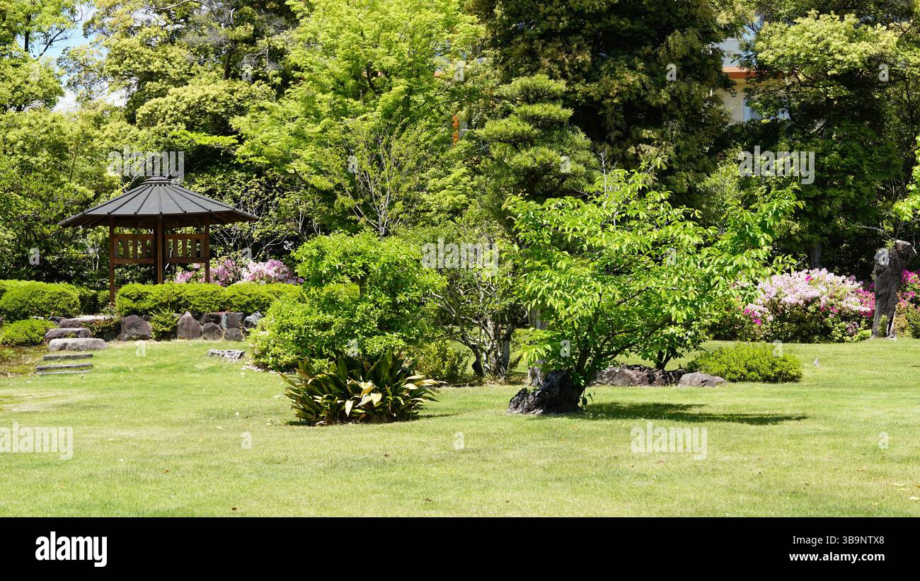 Tranquil Pathways of Yūraku-en:Harmony in a Japanese Garden Stock Photo - Alamy