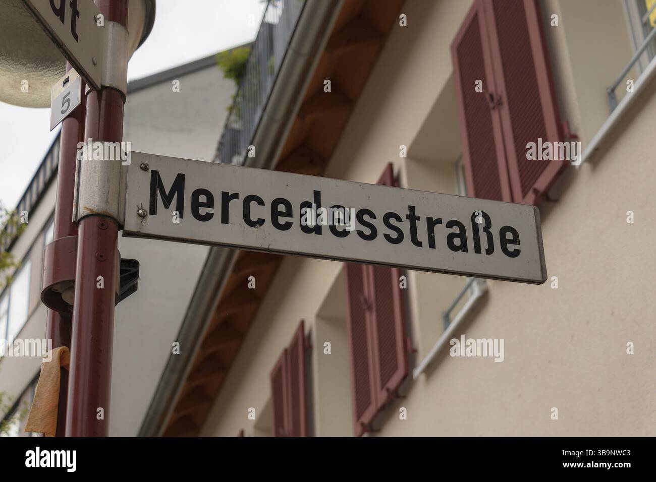 Sign with Mercedes Street lettering in german: Mercedesstrasse in the ...