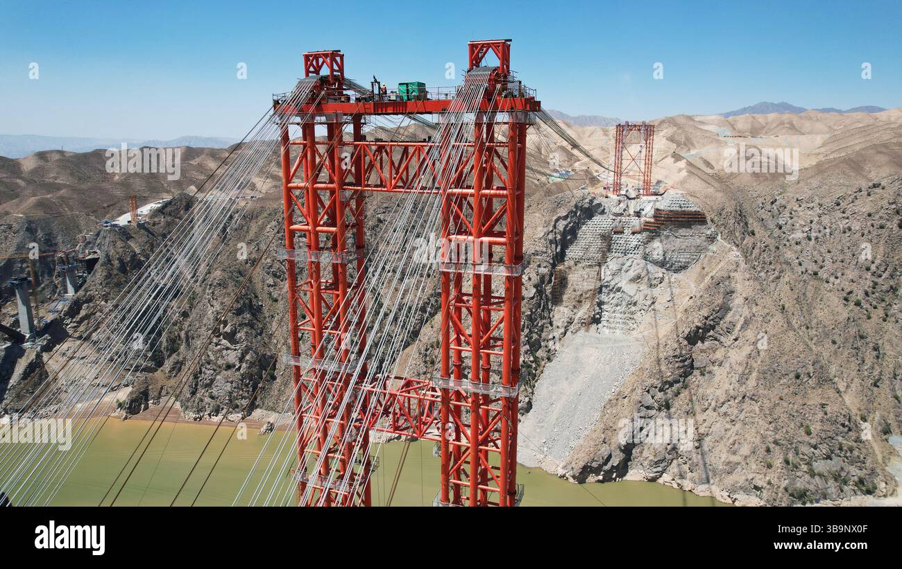 Yongjing. 10th May, 2025. A drone photo shows a 500-ton cable hoisting ...