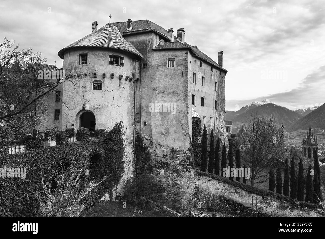 The mighty buildings of Castle Schenna just above the city of Meran are ...