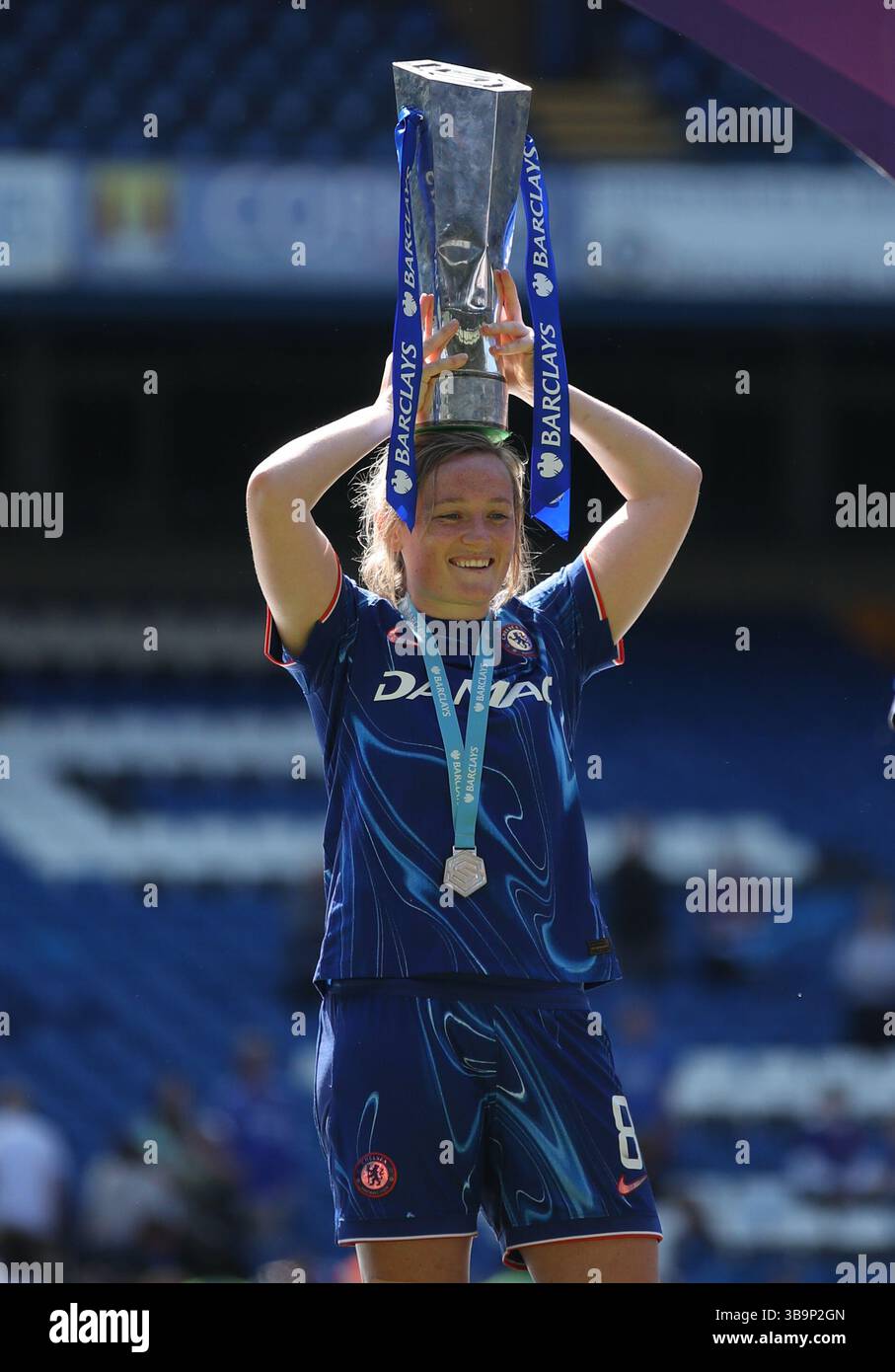 Chelsea’s Erin Cuthbert with the Barclays Women's Super League trophy ...