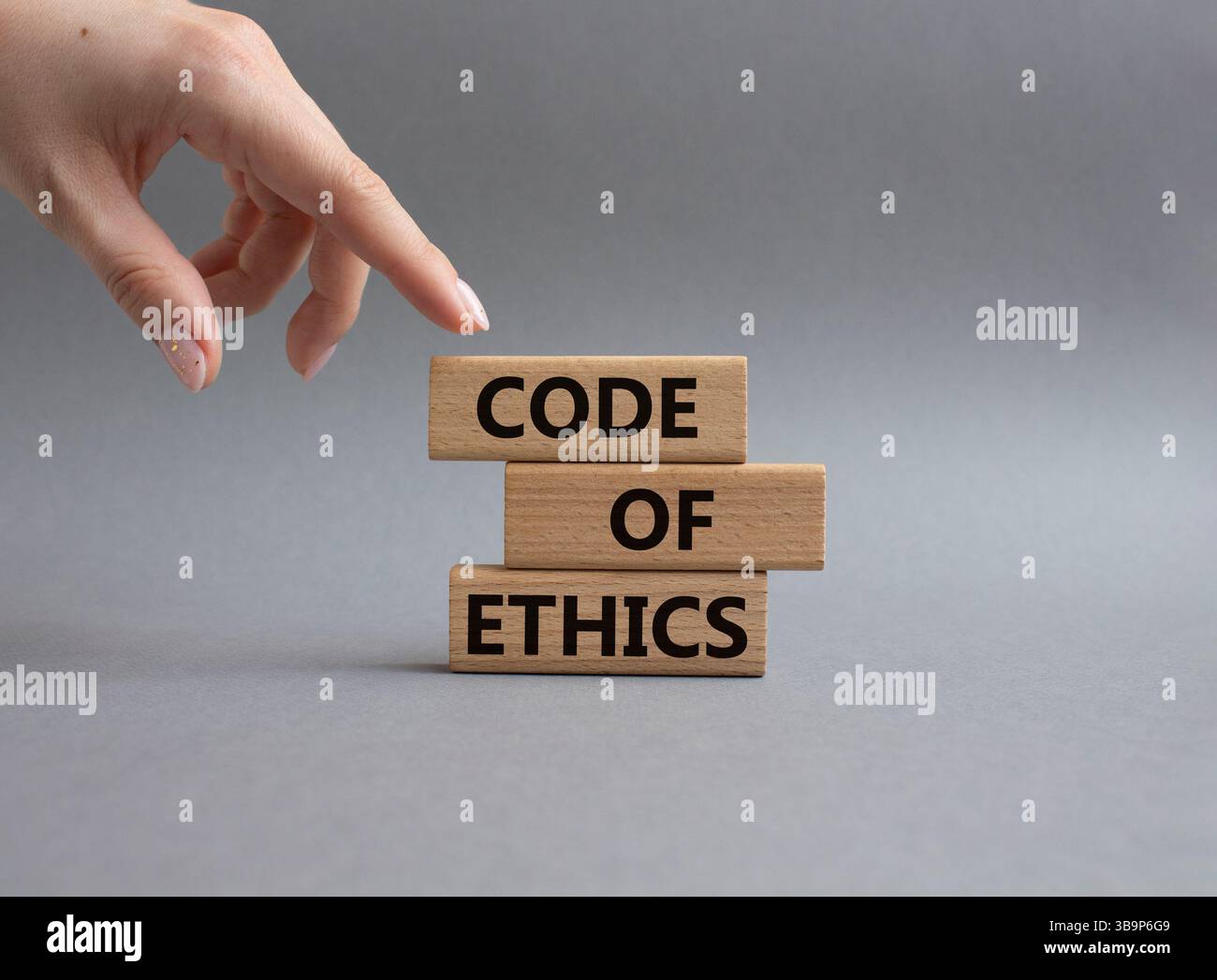 Code of ethics symbol. Concept words Code of ethics on wooden blocks ...
