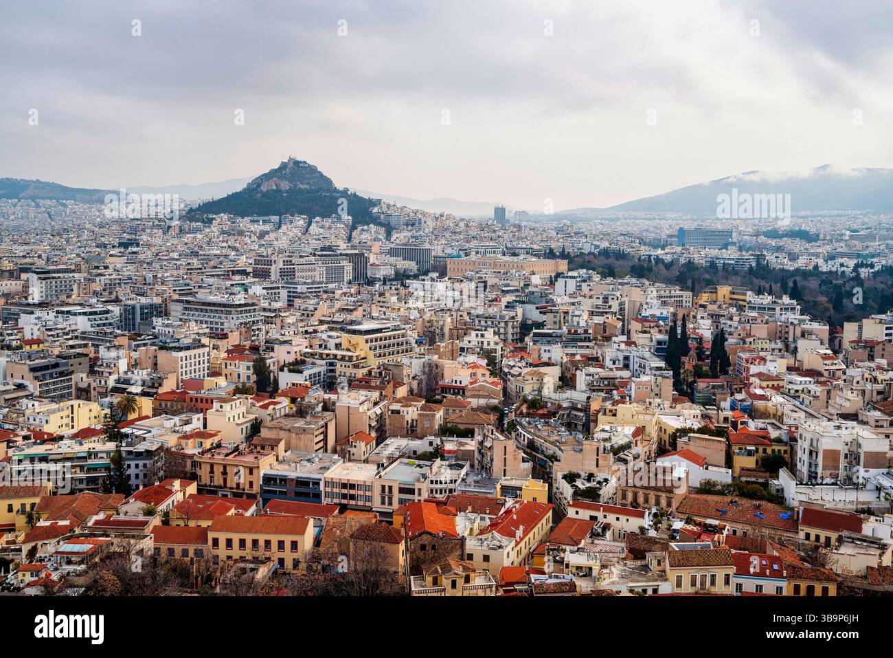 Wide cityscape view from the Acropolis showing densely packed buildings ...