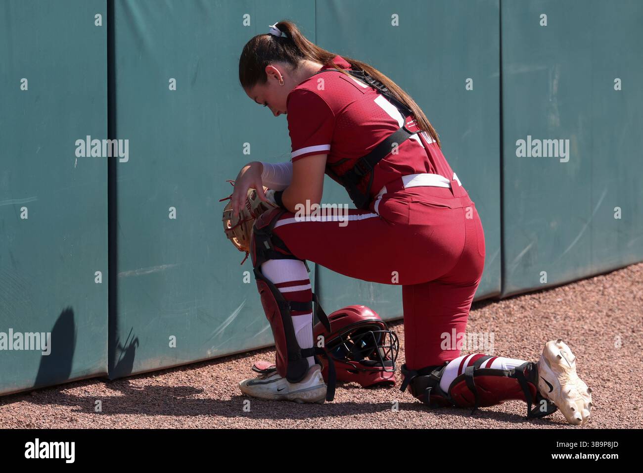 ATHENS, GA - MAY 09: Arkansas catcher Kennedy Miller (17) kneels by ...