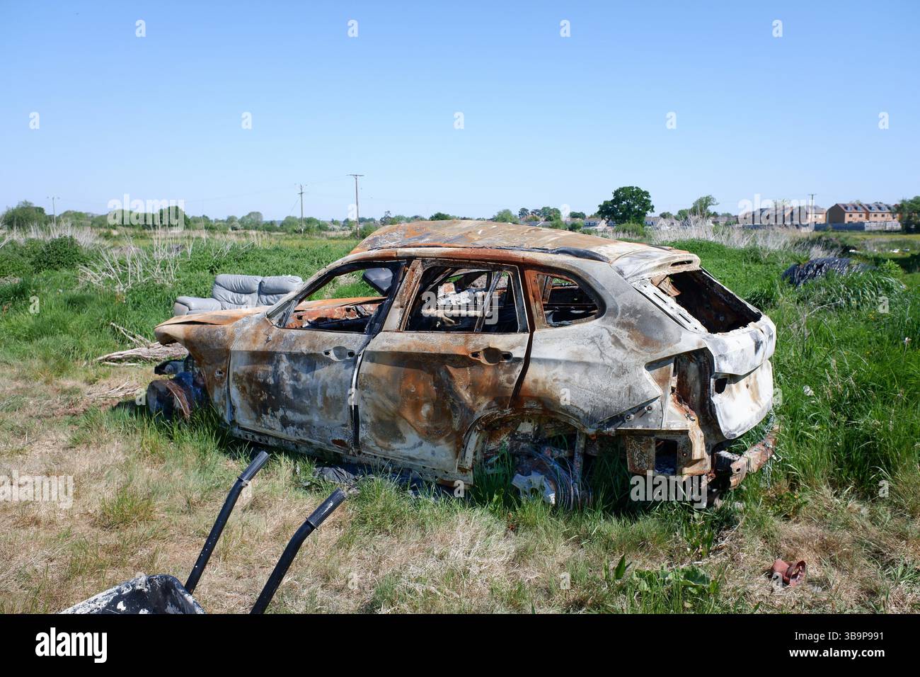 May 2025 - Burnt out wrecked cars, a BMW 1 series & and Opel or ...