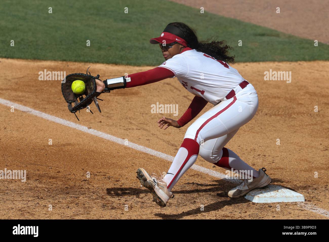 ATHENS, GA - MAY 09: Oklahoma first baseman Cydney Sanders (1) catches ...