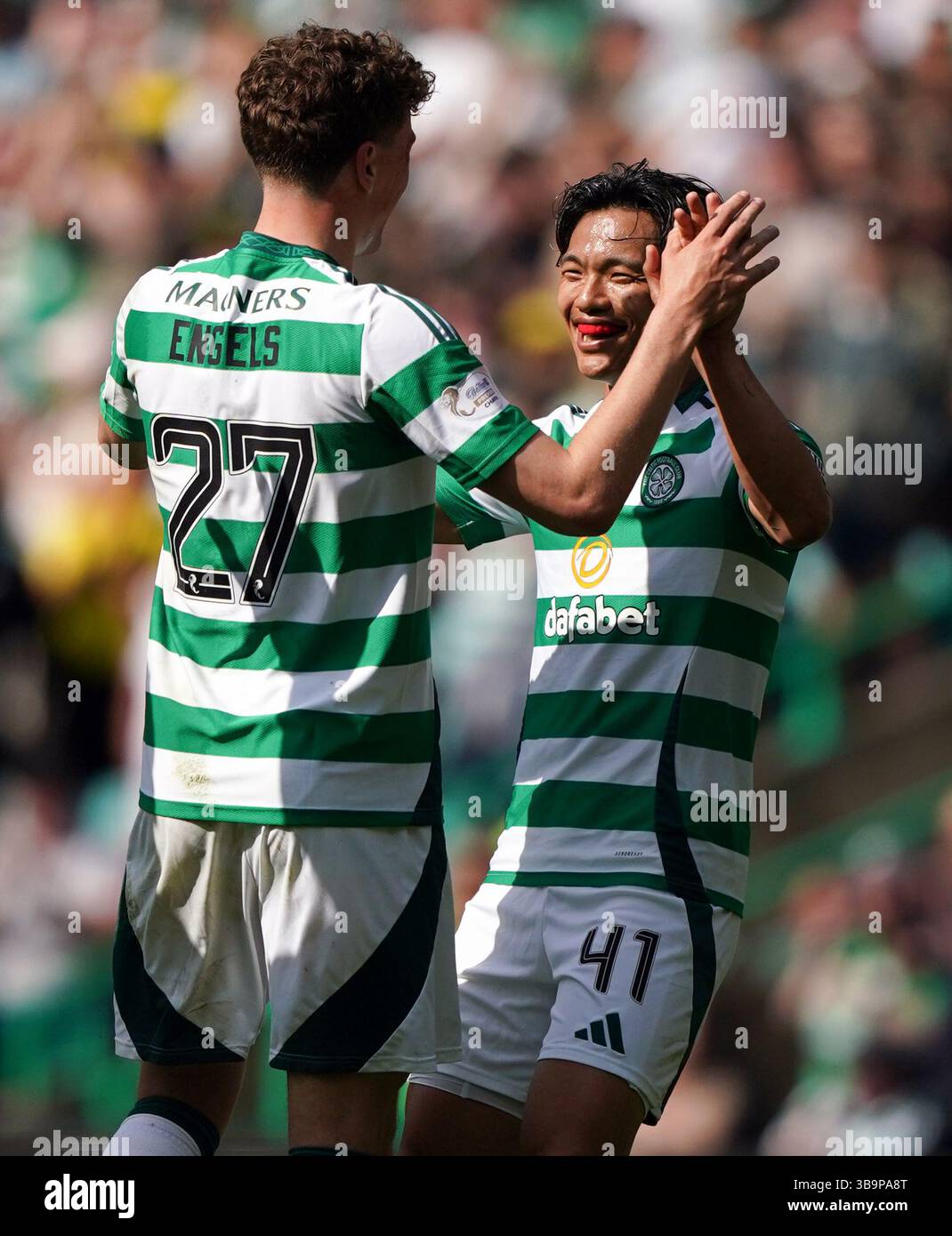 Celtic's Reo Hatate celebrates with team mates after scoring his sides ...