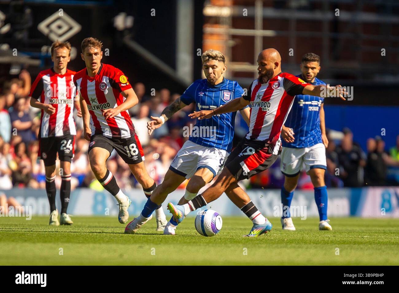 Bryan Mbeumo of Brentford fouls Julio Enciso of Ipswich Town during the ...