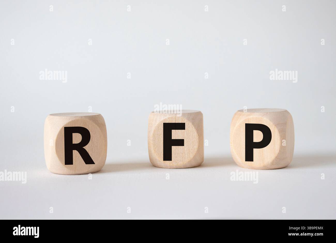 RFP - Request for Proposal. Wooden cubes with word RFP. Beautiful white ...