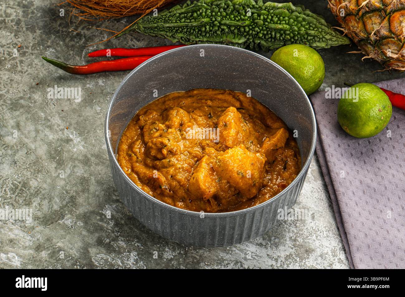 Indian cuisne - Chicken massala with sauce and spices Stock Photo - Alamy