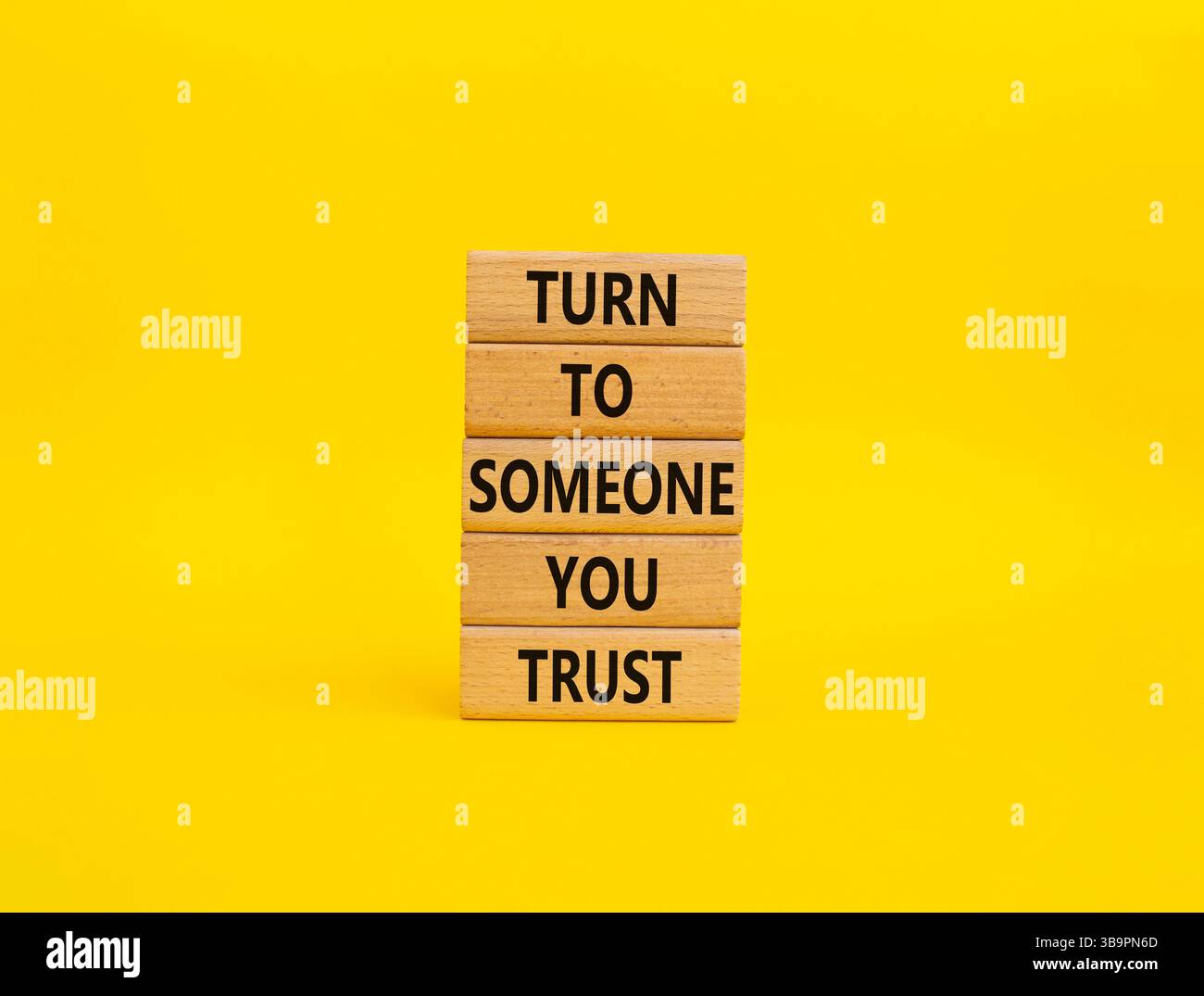 Turn to Someone you trust symbol. Wooden blocks with words Turn to ...