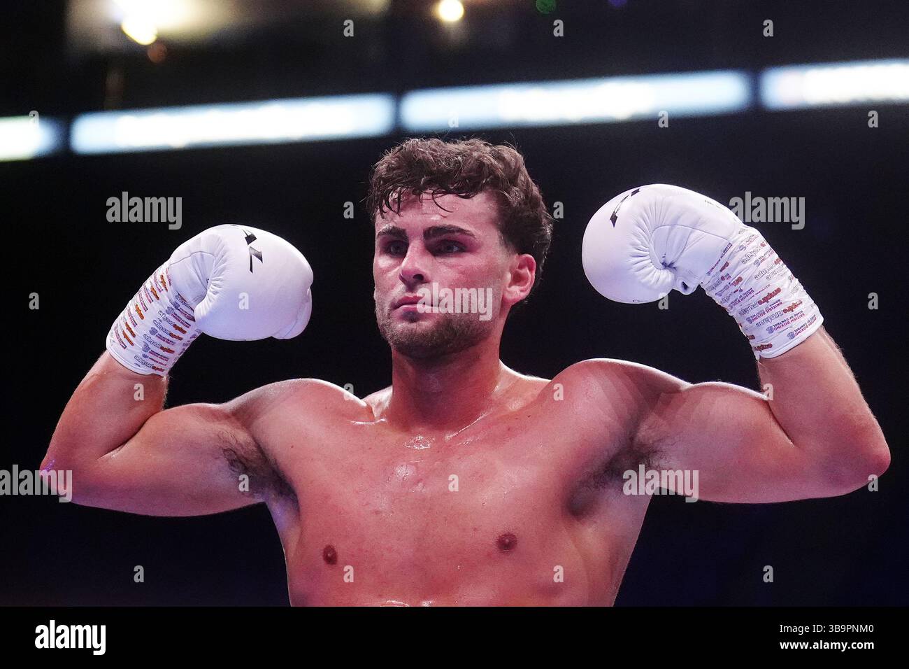 Joe Cooper celebrates winning their middleweight bout against Dmitri ...