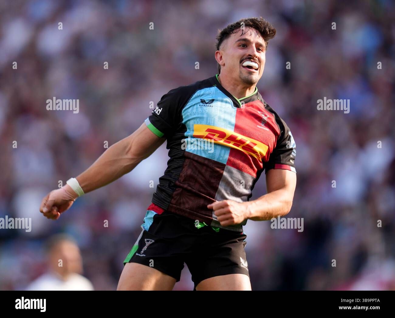 Harlequins' Cadan Murley celebrates scoring his teams first try during ...