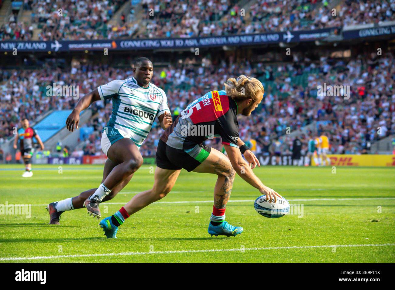 Ball carrier sprinting in pitch hi-res stock photography and images - Alamy