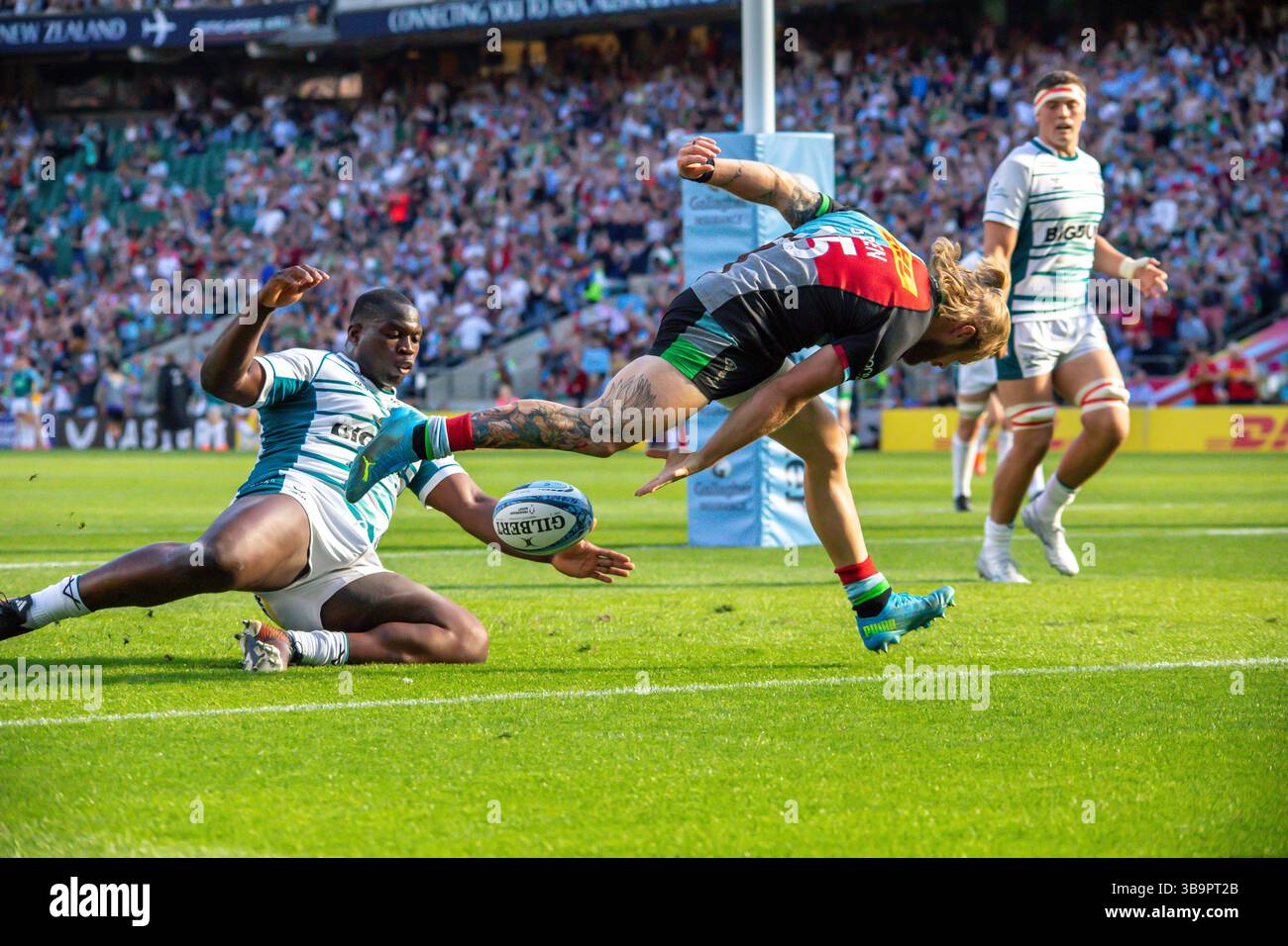 Ball carrier sprinting in pitch hi-res stock photography and images - Alamy