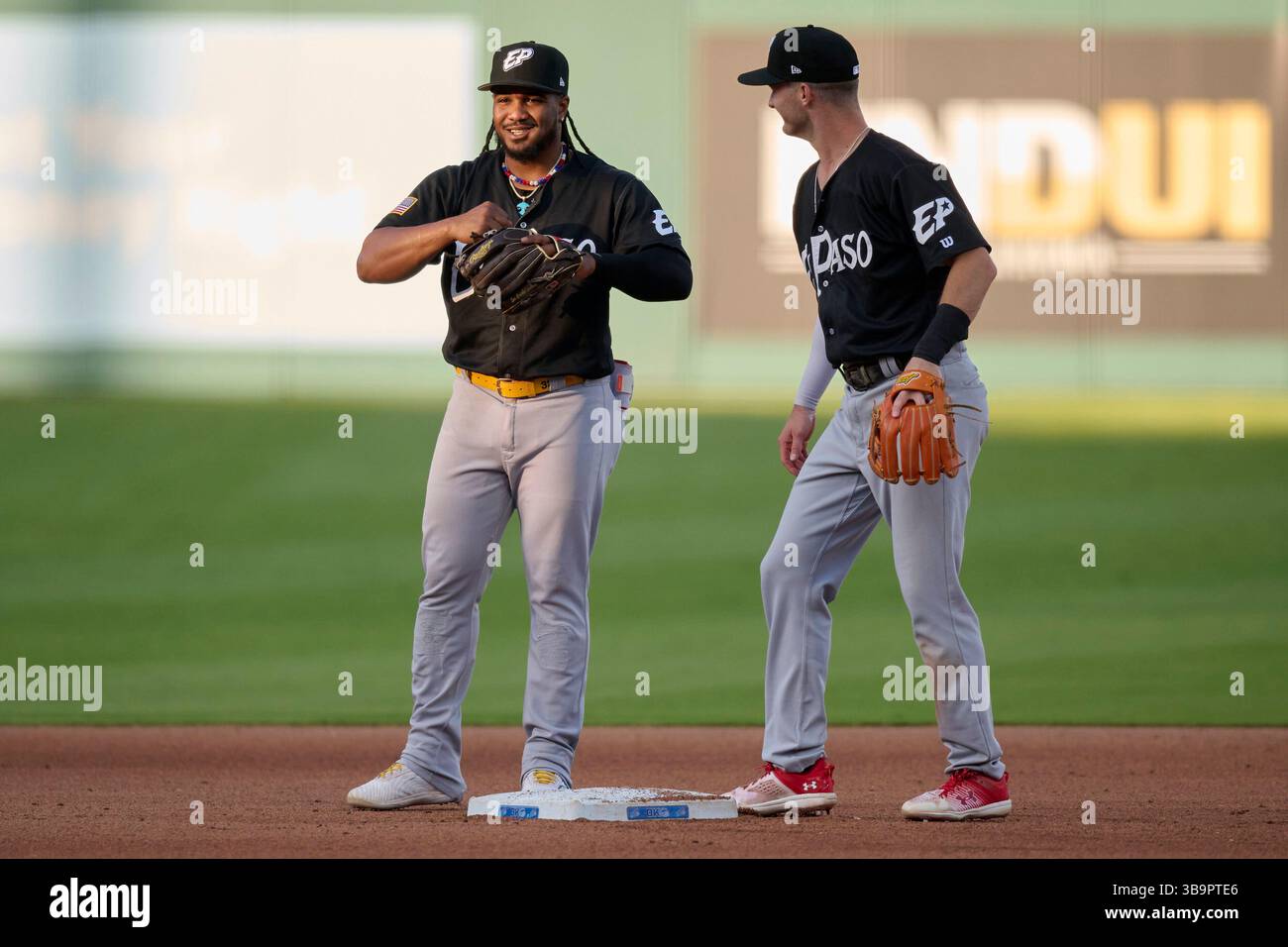 El Paso Chihuahuas shortstop Eguy Rosario (5, left) and second baseman ...
