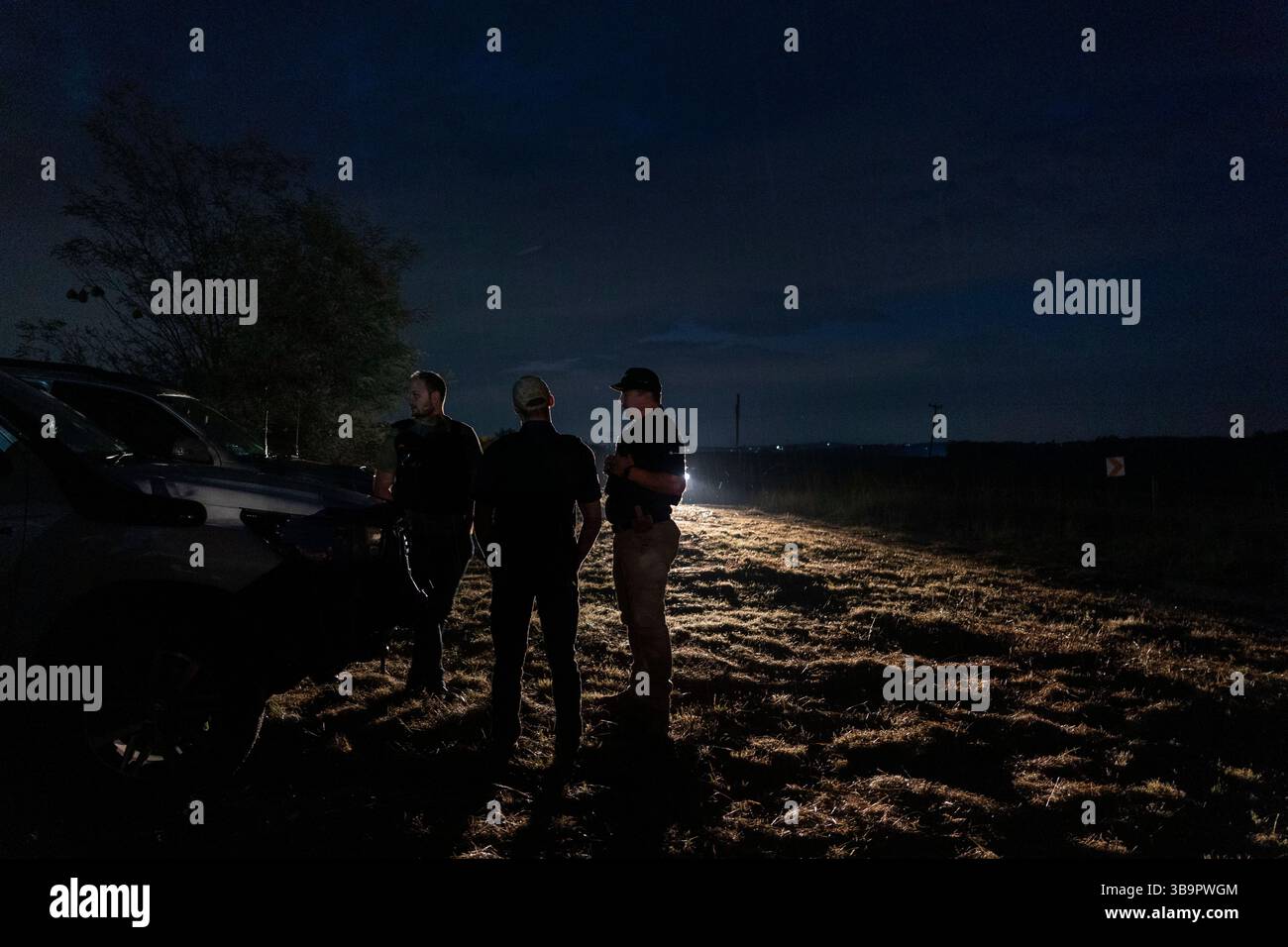 Members of Afriforum, a neighborhood and farm security group, assemble ...