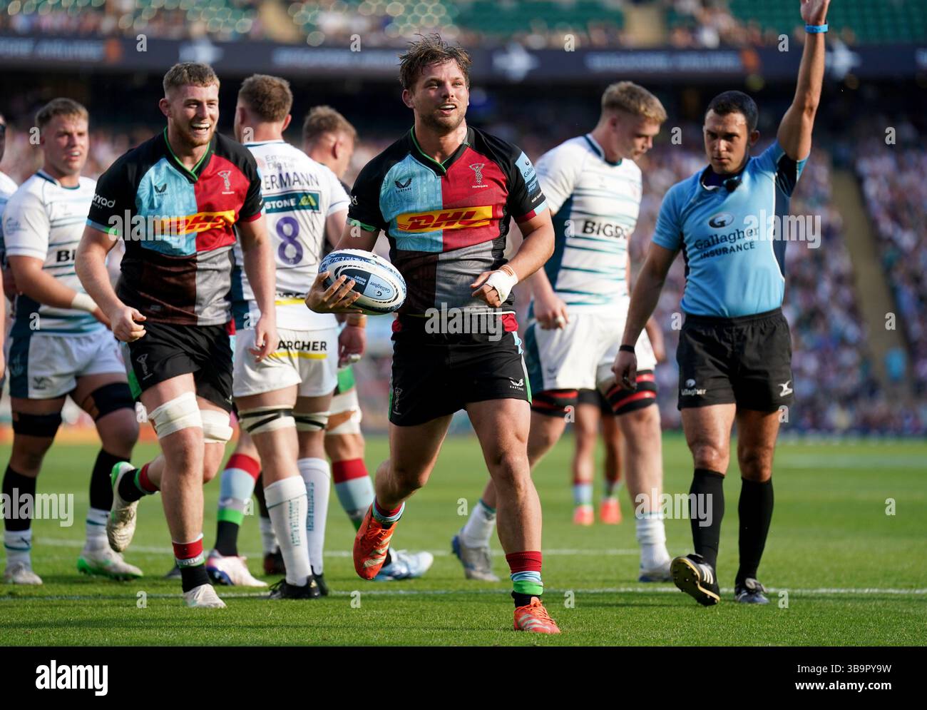 Harlequins' Will Evans celebrates after scoring his sides second try ...