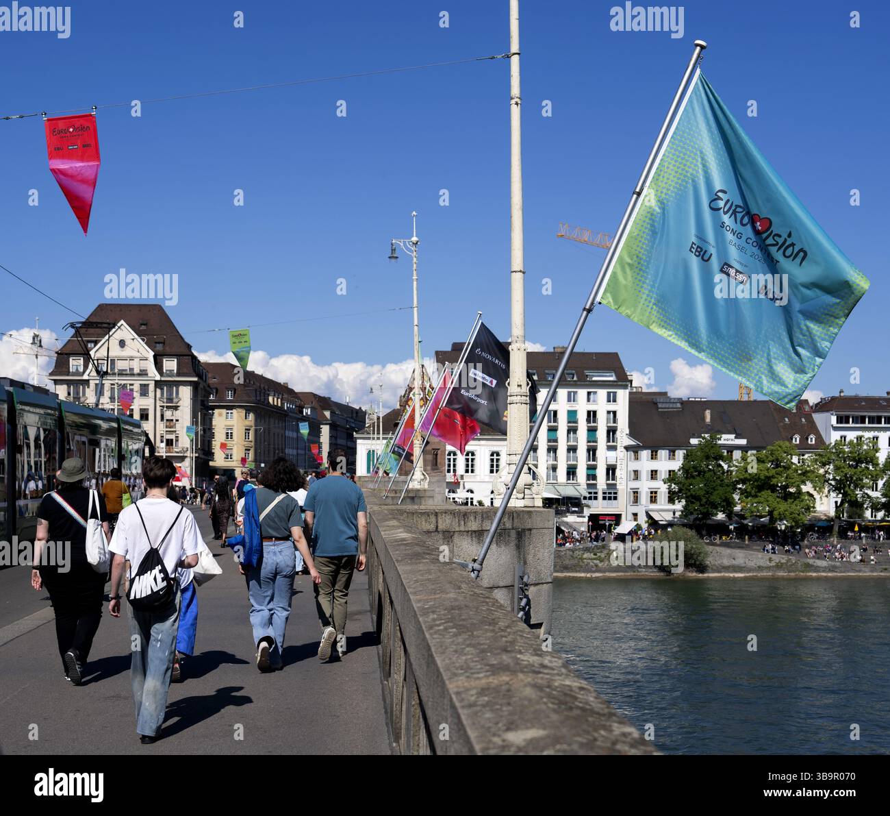 BASEL - Flags in Basel's city center (Mittlere BrÃ¼cke) where the 2025 ...