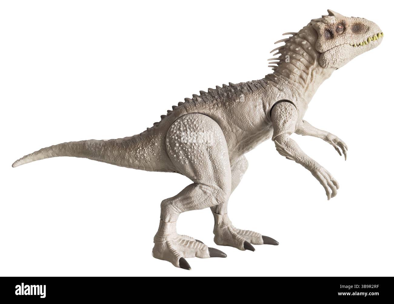 Indoraptor dinosaur toy isolated on white background, side view Stock ...
