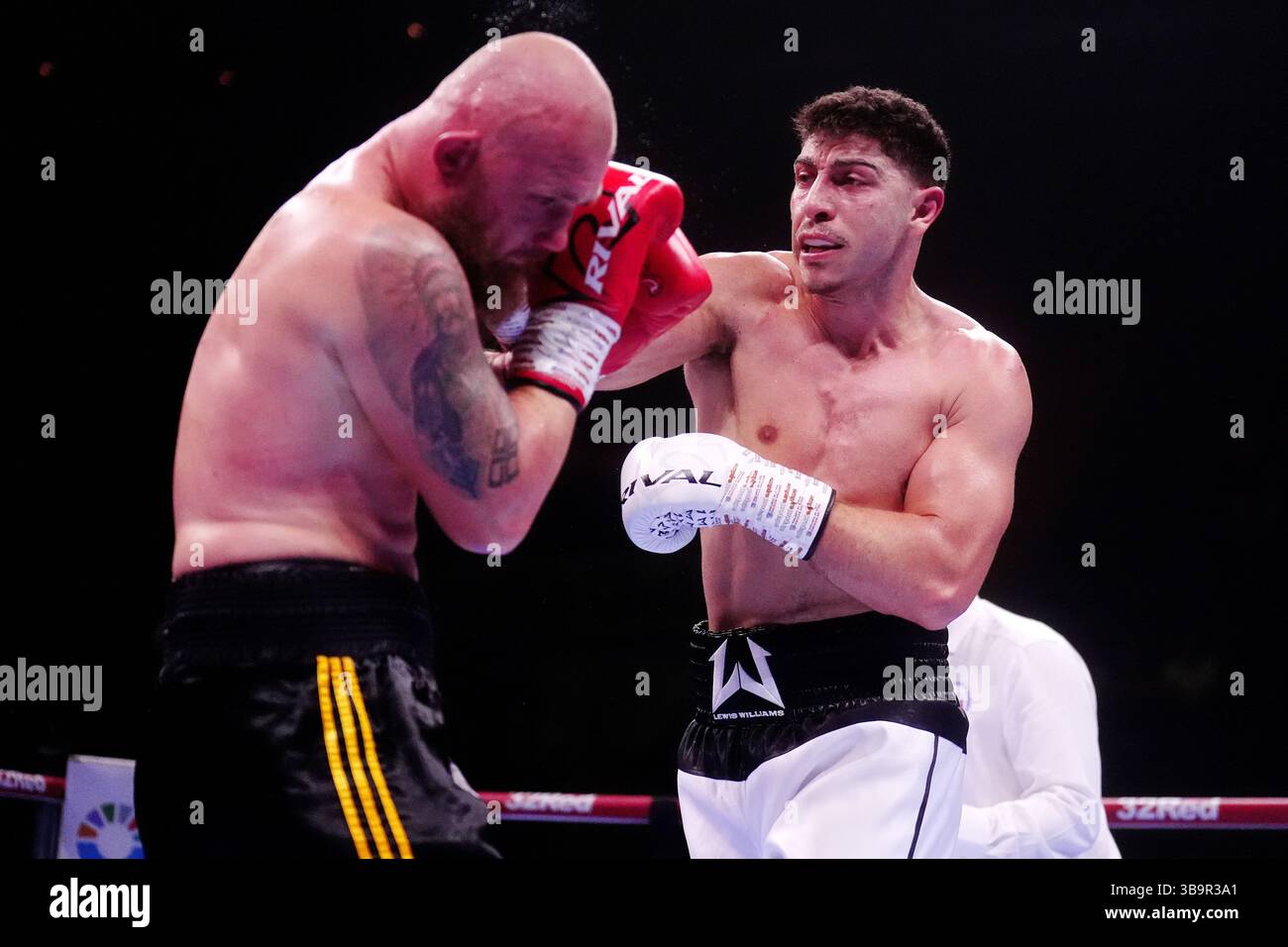 Lewis Williams (right) and Viktar Chvarkou in action during their ...