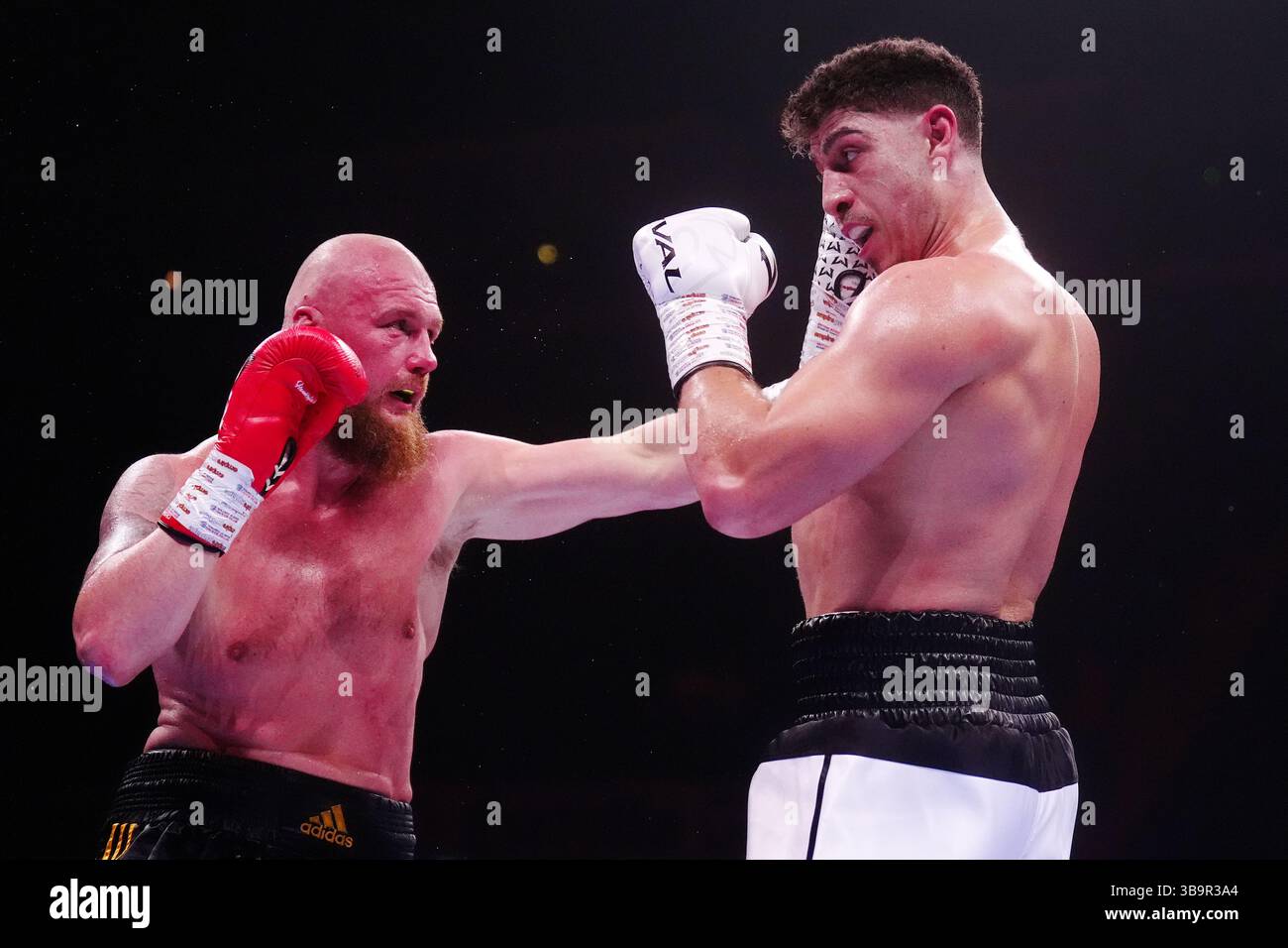 Lewis Williams (right) and Viktar Chvarkou in action during their ...