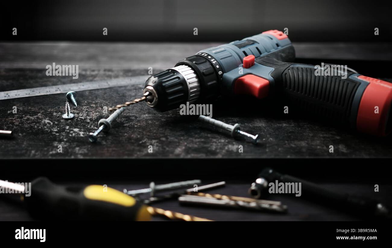 Carpenter Tools, Screws, And A Drill For Hanging Shelves On A Table ...